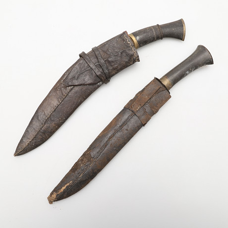 A VINTAGE NEPALESE KUKRI, AND ANOTHER NEPALESE DAGGER. Weapons ...