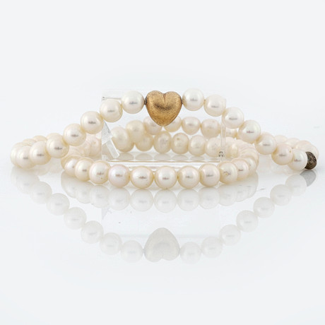 OLE LYNGGAARD. Necklace, pearls with heart-shaped clasp, 18K gold ...