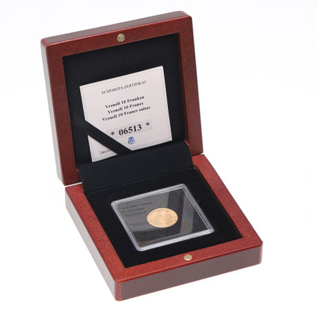 A SWISS 10F GOLD COIN. Coins, Medals & Stamps - Coins - Auctionet