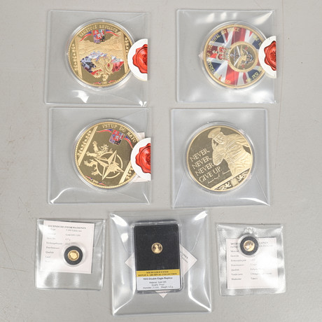THREE 14 CARAT GOLD MINIATURE MEDALLIONS AND 4 GOLD ON COPPER ...