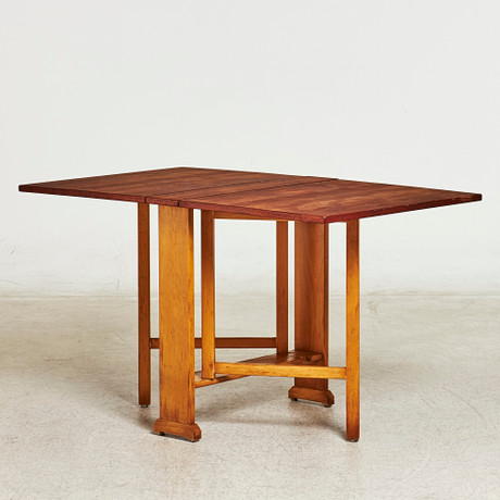 CARL MALMSTEN. Slag table, "The gunsmith", table top in teak, base in ...
