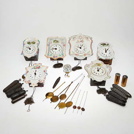 Collection of porcelain shield clocks / pendulum clocks, porcelain ...
