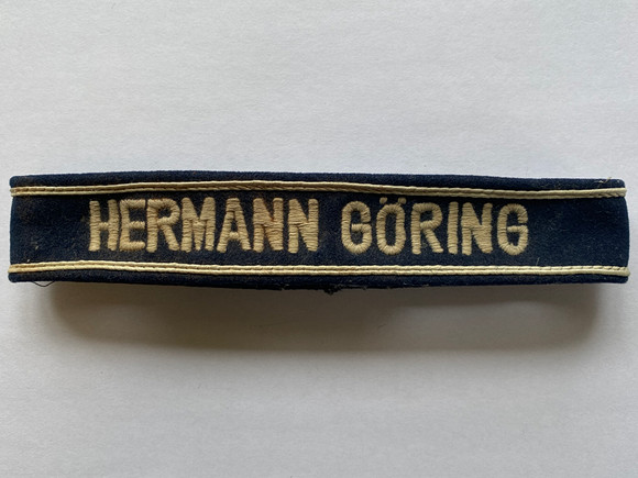 A SECOND WORLD WAR GERMAN LUFTWAFFE 'HERMANN GORING' CUFFBAND. Weapons ...