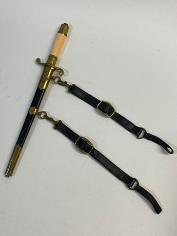 A POLISH AIRFORCE OFFICER'S DAGGER AND SCABBARD WITH HANGING STRAPS ...