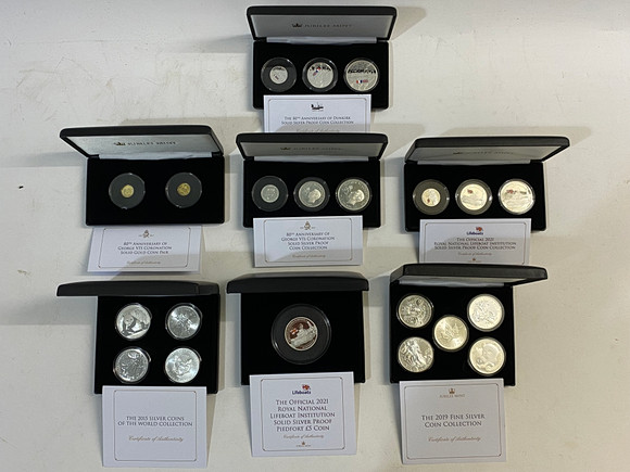 A COLLECTION OF JUBILEE MINT GOLD AND SILVER PROOF COIN SETS. Coins ...