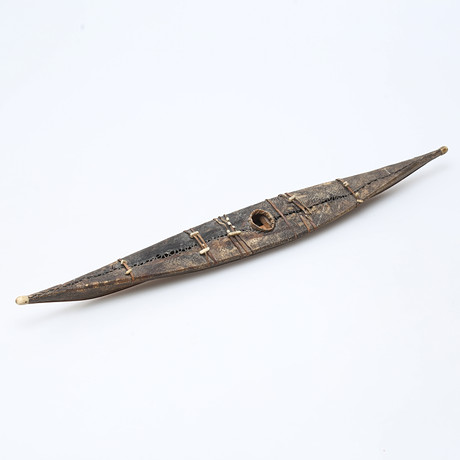 MODEL. Inuit kayak, skin, wood and bone. The first part of the 20th ...