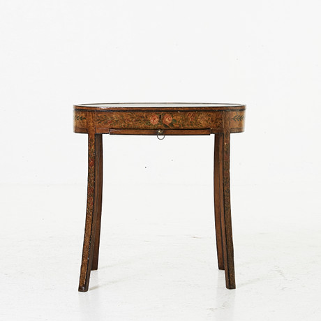 TABLE, 19th century, decor of painted scrolls, leather covered table ...