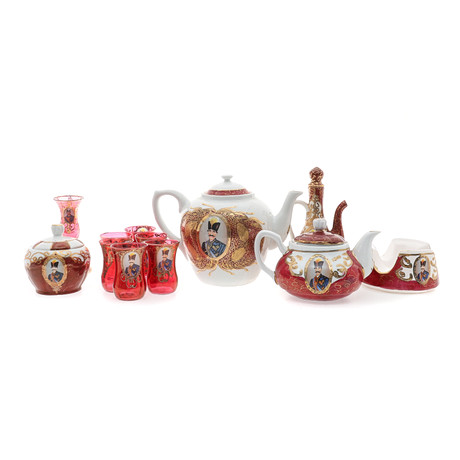 A COLLECTION OF PORCELAIN AND RED GLASSWARE WITH A PORTRAIT BUST OF ...