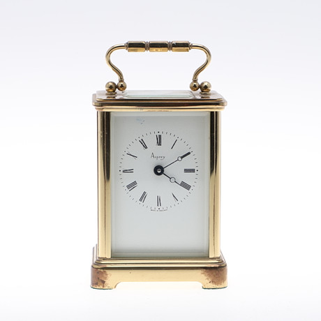 AN ASPREY CARRIAGE CLOCK. Clocks & Watches - Mantel clocks - Auctionet