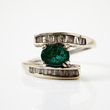 RING, 14k rhodium-plated white gold, oval faceted emerald, 23 channel ...