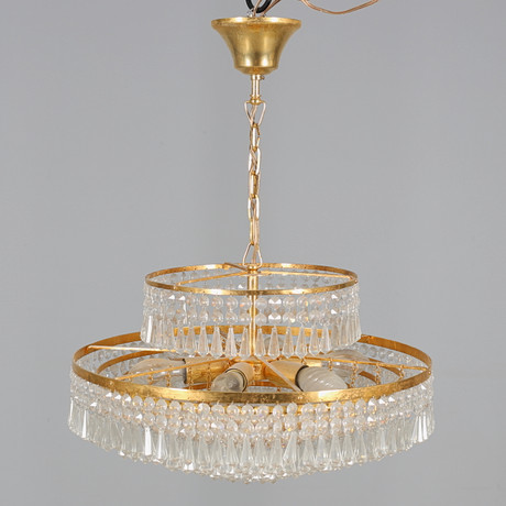 TAKLAMPA, stomme av mässing, behängd med glasprismor, 1900-talets andra ...