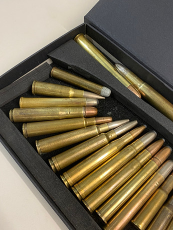 A COLLECTION OF NINETEEN INERT RIFLE CARTRIDGES. Licence weapons ...