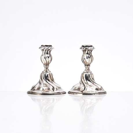 CANDLE STICKS, a pair, silver, rococo style, twisted gold crowning ...