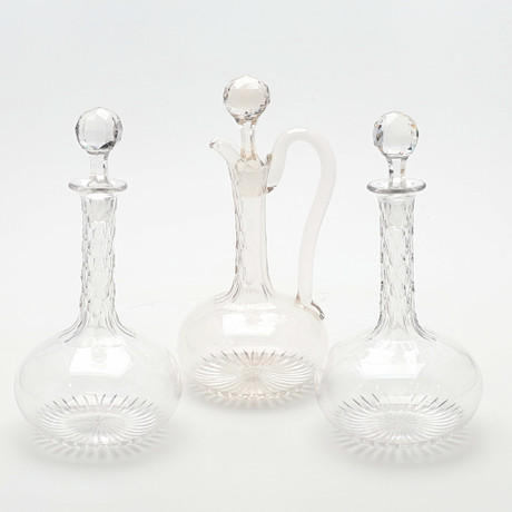 A PAIR OF VICTORIAN GLOBE AND SHAFT CUT GLASS DECANTERS, AND A MATCHING ...