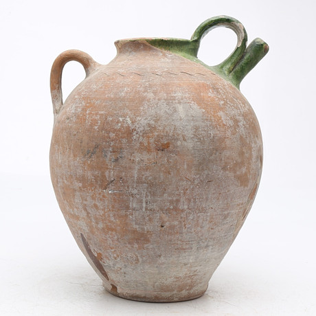 Spanish jug in earthenware, partially glazed in green, first third of ...