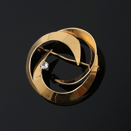 BROSCHE, 18 Karat Gold mit weißem Stein. Die Goldschmiedegesellschaft ...