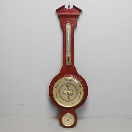 A MODERN WALL MOUNTED BAROMETER. Furniture - Other - Auctionet
