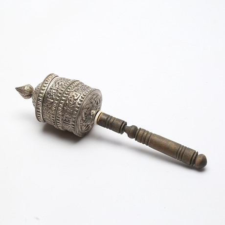 TORA ROLL, white metal and wood. Asiatica - Auctionet