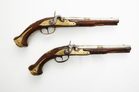 BUCKET PISTOLS, a pair, mid-European, 18th century, modified from ...