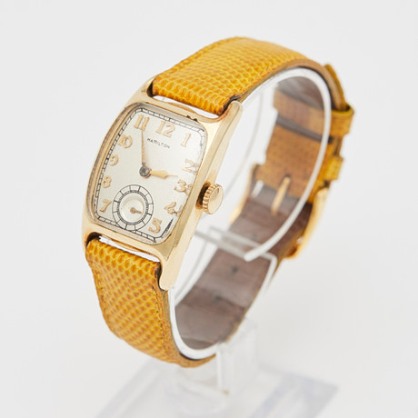 HAMILTON. WRISTWATCH, manual winding, 14K gold-plated steel, plastic ...
