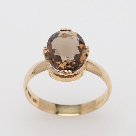 OTTO HOLM, RING, 18k gold with cut brown citrine, Lund 1910, total 3.6 ...