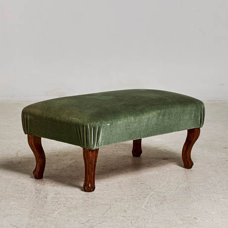OTTOMAN/FOOTBALL, early 20th century, covered in green plush. Furniture ...