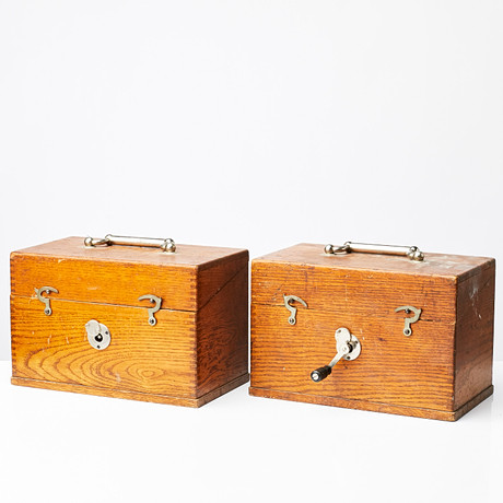 FIELD TELEPHONES, 2 pcs, LM Ericsson, early 20th century, in wooden ...