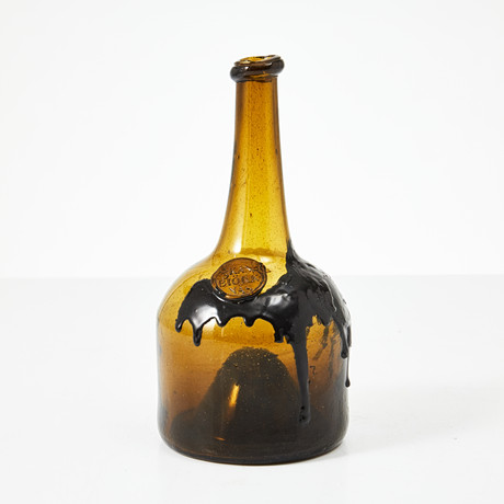 BJÖRKNÄS GLASBRUK (1736-1785), Flaska, tonat glas i brungrönt, liv med ...