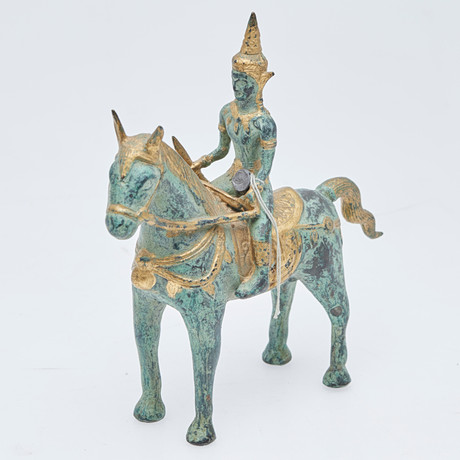 Figur/ skulptur, Buddha till häst Kanthaka, Asien. Asiatika - Auctionet