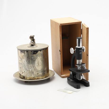 AN EARLY 20TH CENTURY SILVER PLATED BISCUIT BARREL, AND A CASED STUDENT ...