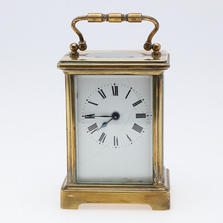 EN MÄSSING VAGN KLOCKA. Klockor & Ur - Bordsur - Auctionet