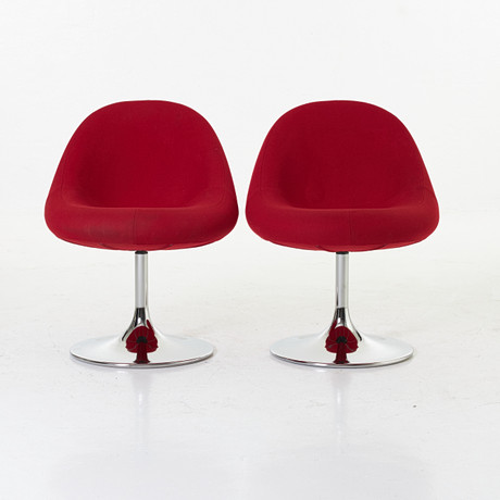 SPINNING ARMCHAIRS, a pair, 2000s, chrome foot, red textile upholstery ...
