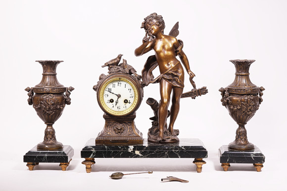 CLOCK WITH GARNISH. PATINATED CALAMIN WITH MARBLE. END OF THE XIX ...