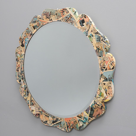 A CONTEMPORARY CIRCULAR MIRROR, THE SHAPED FRAME PASTED WITH PAGES FROM ...