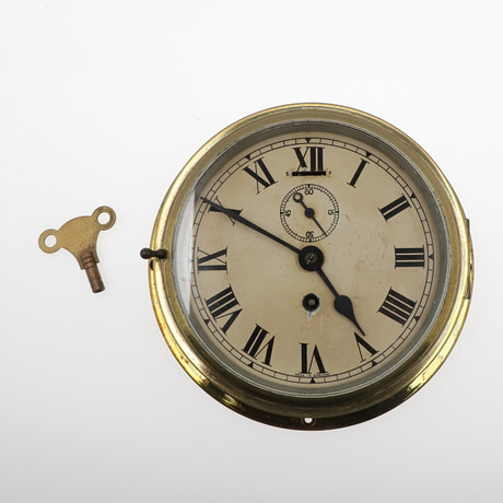 A CIRCULAR BRASS SHIPS WALL CLOCK. Clocks & Watches - Wall Clocks ...