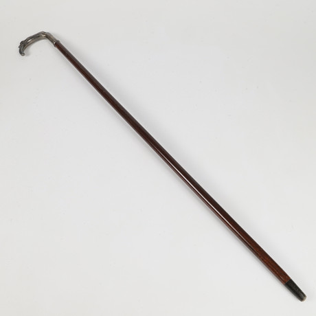 WALKING CANE, wood/white metal with dog decoration. Miscellaneous ...