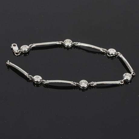 (2022) ARMBAND, 18k vitt guld, med 6 briljanter tot. 018ct. Guld ...