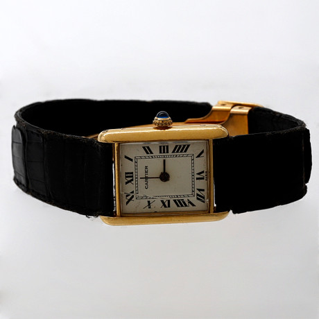 Cartier Tank i guld. Klockor & Ur - Armbandsur - Auctionet