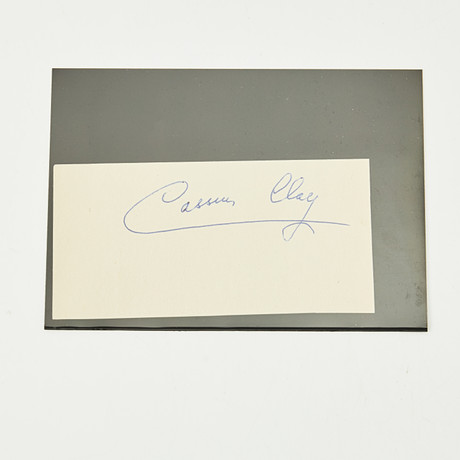 CASSIUS CLAY (MUHAMMED ALI), autograph on paper, with printed ...