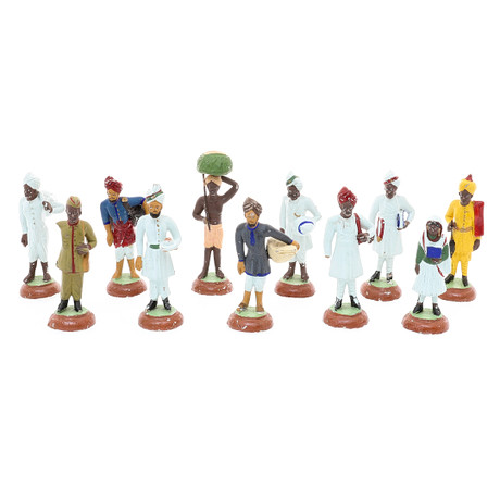 A COLLECTION OF 11 INDIAN PAINTED PLASTER FIGURES, EARLY 20TH CENTURY ...