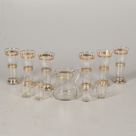 A MID-20TH CENTURY GLASS CORDIAL SET AND SIX SIMILAR BEAKERS. Glass ...