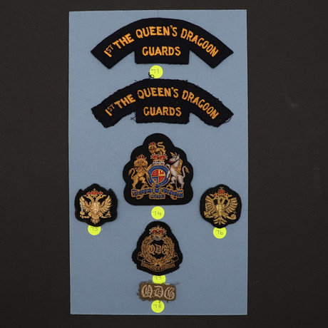 A COLLECTION OF 1st QUEEN'S DRAGOON GUARDS CLOTH PATCHES. Weapons ...