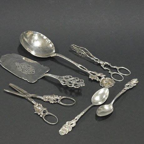 SIX PIECES OF SILVER OBJECTS INCL. CAKE TONGS, GRAPE SCISSORS. Silver ...
