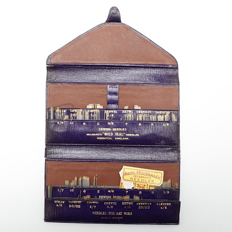 A LATE VICTORIAN TOOLED LEATHER NEEDLE CASE BY MILWARD'S OF REDDITCH ...