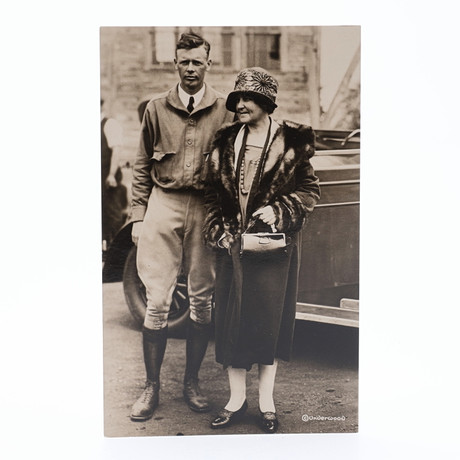 A BLACK AND WHITE PHOTOGRAPH OF AVIATOR AND AUTHOR CHARLES LINDBERG AND ...