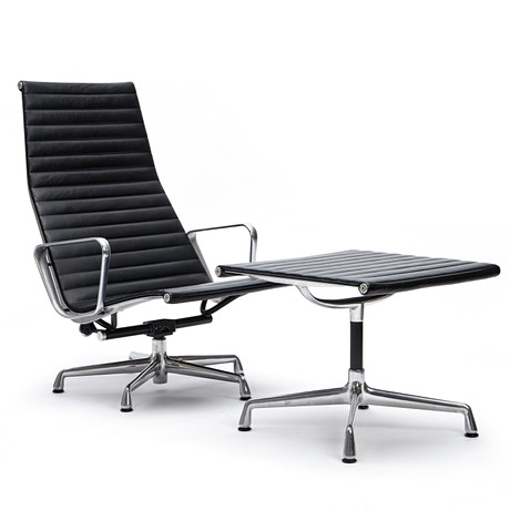 CHARLES AND RAY EAMES (USA, 1907-1978). Armchair with footstool, EA 124 ...