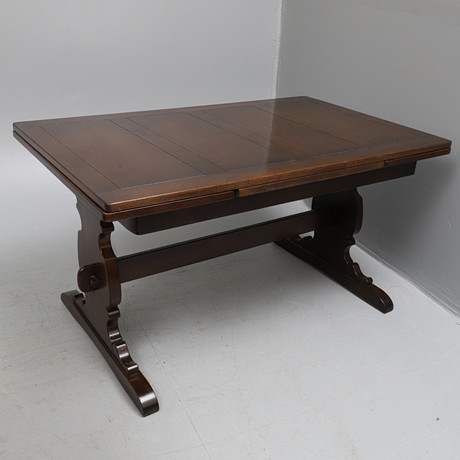 AN ERCOL 'OLD COLONIAL' DRAW-LEAF DINING TABLE. Furniture - Dining room ...