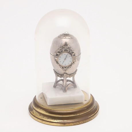 A MODERN 'EASTER EGG' CLOCK. Silver & Metals - Silver - Auctionet
