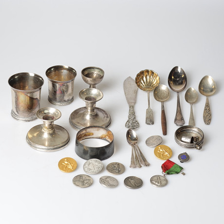 SILVER OBJECTS, 25 parts, i.a. spoons, cups & medals. Total weight ...