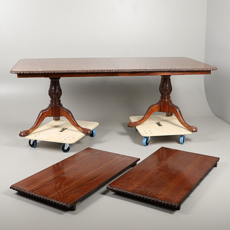 A LARGE REPRODUCTION CHIPPENDALE STYLE TWIN PILLAR EXTENDING DINING ...